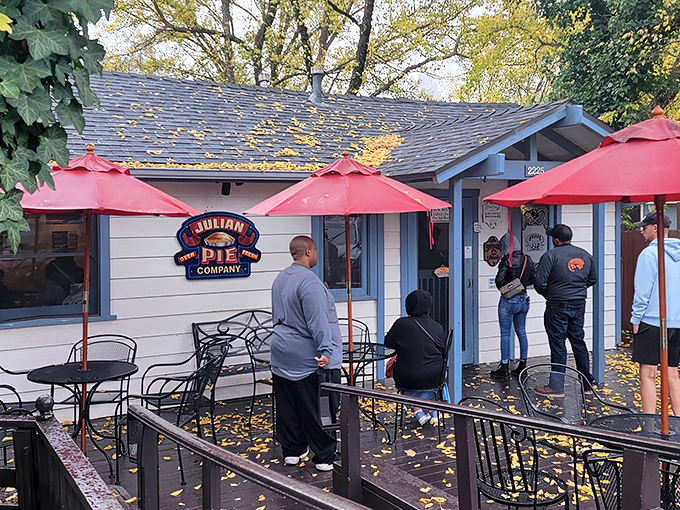 The pilgrimage begins! Julian Pie Company's charming exterior with its signature red umbrellas promises sweet salvation after the winding mountain drive.