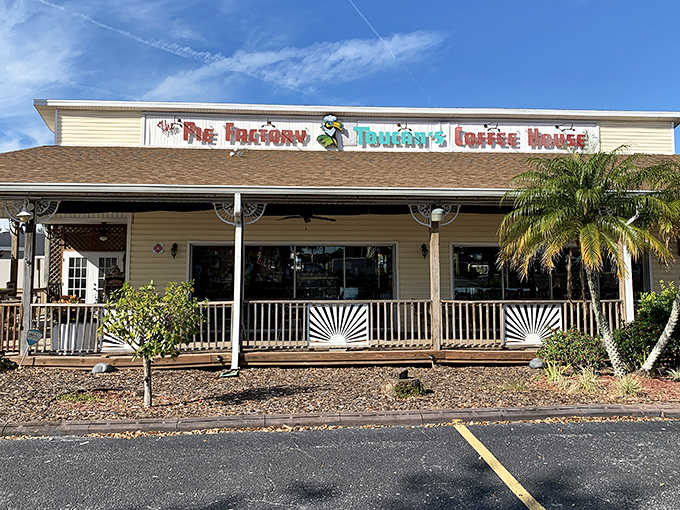 The Pie Factory's charming Old Florida exterior promises sweet treasures within. Palm trees and a welcoming porch set the perfect stage for pie-based euphoria.