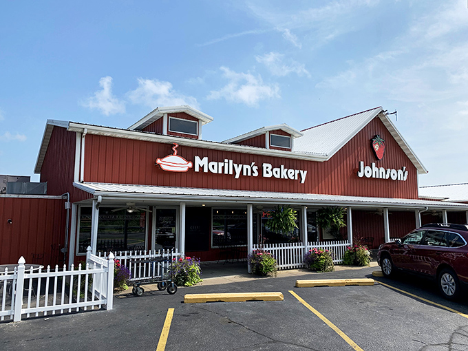The red barn exterior of Marilyn's isn't just charming—it's a beacon of hope for those who believe butter makes everything better. Fall decorations complete the Hoosier welcome.