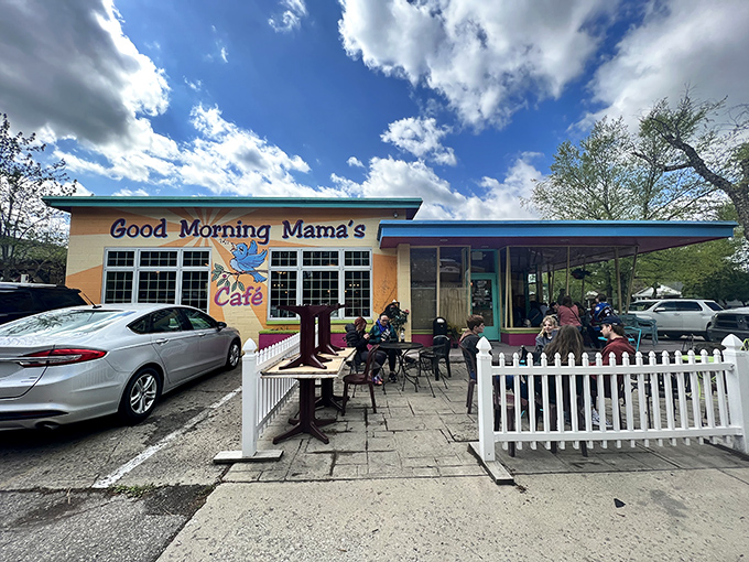 The sunshine-yellow exterior of Good Morning Mama's isn't just a building—it's a morning mood elevator with turquoise trim and a bluebird promising delicious things inside.