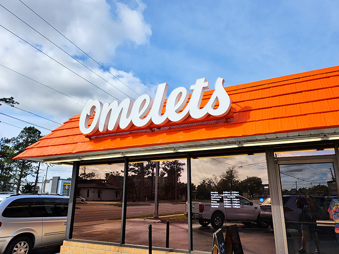 The iconic orange roof of Goody Goody Omelet House stands out like a breakfast lighthouse guiding hungry souls to their morning salvation. 