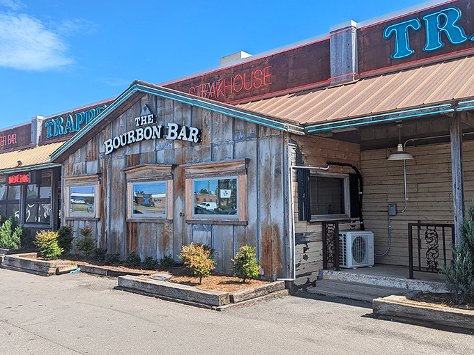 The weathered wooden exterior of Trapper's Fishcamp & Grill looks like it was teleported straight from a Louisiana bayou to Oklahoma City. Pure rustic charm!