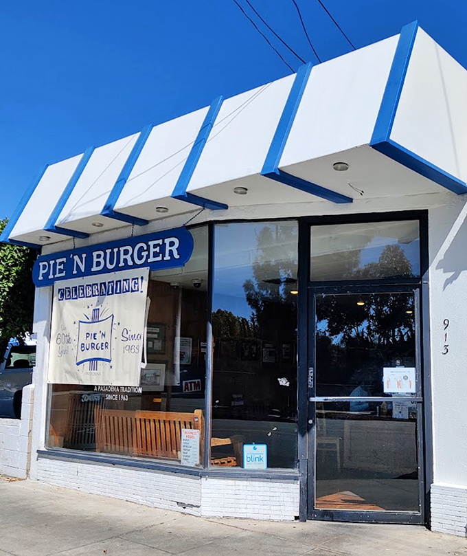 The unassuming white and blue exterior of Pie 'n Burger stands like a time capsule on Pasadena's California Boulevard, promising honest food without the fanfare.