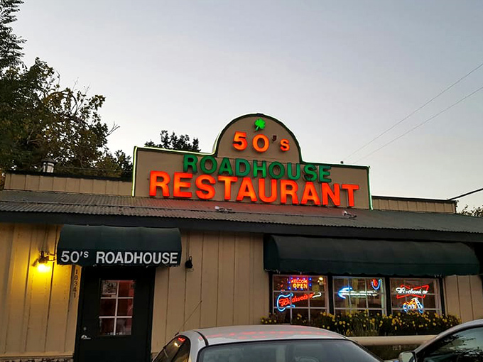 The classic roadside charm of 50's Road House beckons with its vibrant signage and green awnings—a time portal disguised as a restaurant in Knights Ferry.