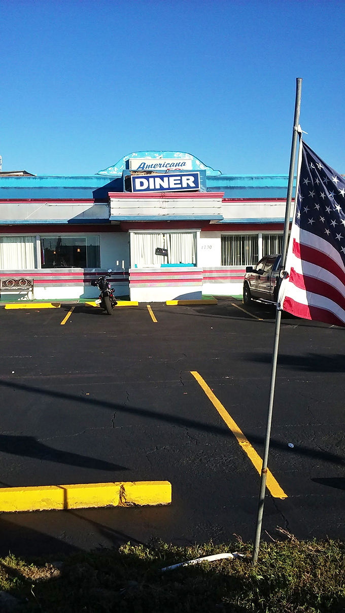 The technicolor dreamcoat of diners! Americana 50's Family Diner's exterior pops against the Florida sky like a Technicolor postcard from the past.