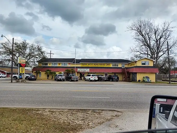 The pink metal roof and bold yellow signage of Mama Jack's – Texas' culinary equivalent of finding a $20 bill in your winter coat pocket.