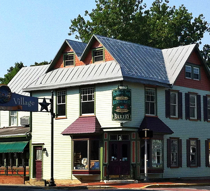 This mint-green Victorian charmer stands like a time capsule in modern Mount Holly, its metal roof and burgundy trim beckoning hungry time travelers.
