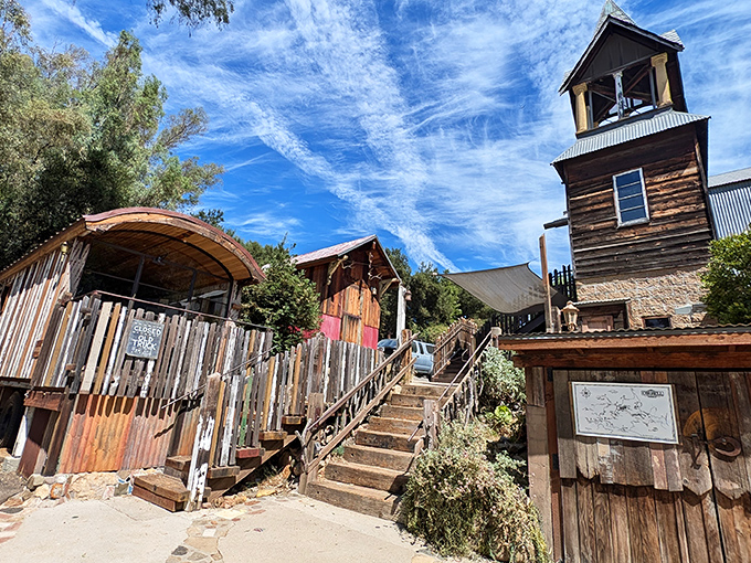 Like something straight out of a Western movie, The Old Place's weathered wooden exterior and bell tower promise adventure before you even step inside.
