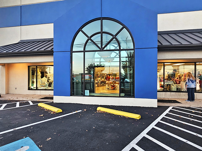 The distinctive purple and beige exterior welcomes treasure hunters with its arched window—like a portal to another shopping dimension.