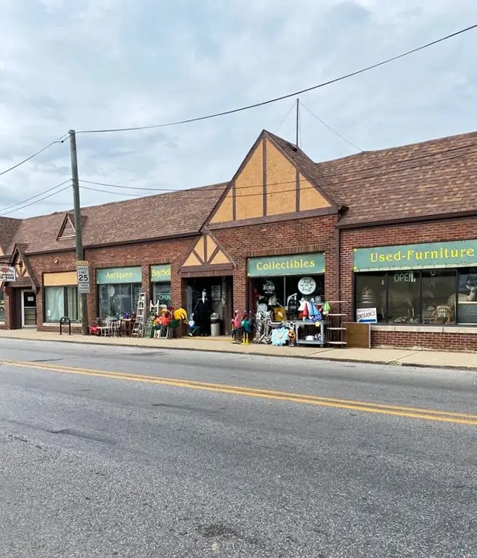 "Purveyors of Fine Junk" isn't just a slogan—it's a promise painted boldly on Audrey's brick facade, beckoning treasure hunters from miles around.