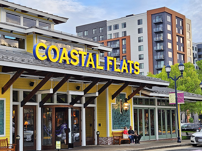 The sunshine-yellow exterior of Coastal Flats stands out in Fairfax like a beach house that took a wrong turn at Virginia Beach and decided to stay.