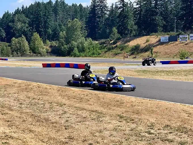The winding track at PGP Motorsports Park beckons speed enthusiasts with its professional-grade curves and the serene backdrop of Washington's evergreens.