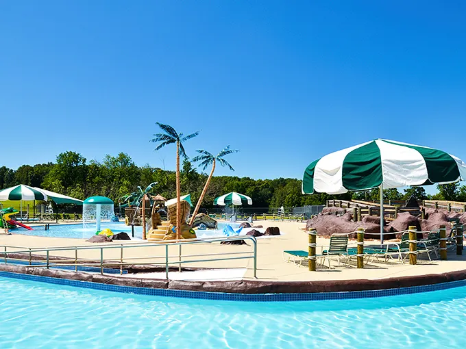 The tropical paradise of Signal Bay beckons with its shallow waters and playful structures—proof that Virginia can do "island getaway" without the airfare.