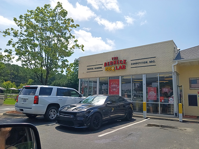 The modest storefront belies the flavor explosion waiting inside – where "Competition. BBQ." isn't just a tagline, it's a scientific promise. 