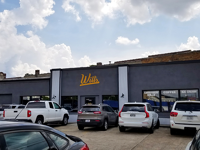 Will's Cinnamon Shop's unassuming gray exterior with bright yellow signage is like Clark Kent – ordinary on the outside, superhero-level deliciousness within.