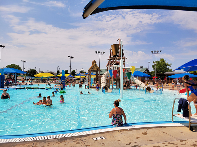 The ultimate Kansas summer survival kit: crystal blue waters, colorful play structures, and enough splashing to make you forget you're in the Midwest.