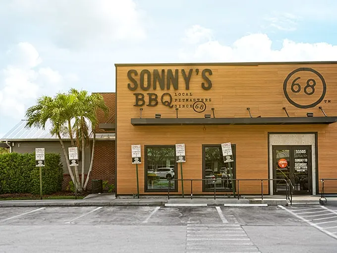 Sonny's wooden façade stands like a beacon of barbecue promise, the "68" emblem reminding us some traditions are worth preserving.