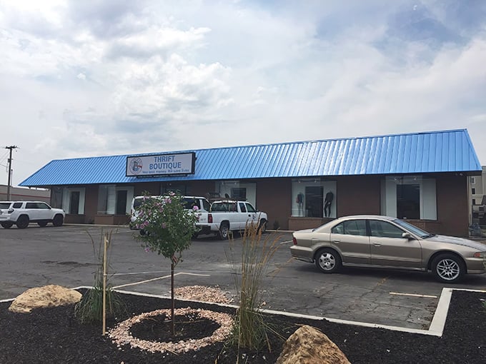 The iconic blue roof of The Other Side Thrift Boutique stands out like a beacon for treasure hunters across Salt Lake City.