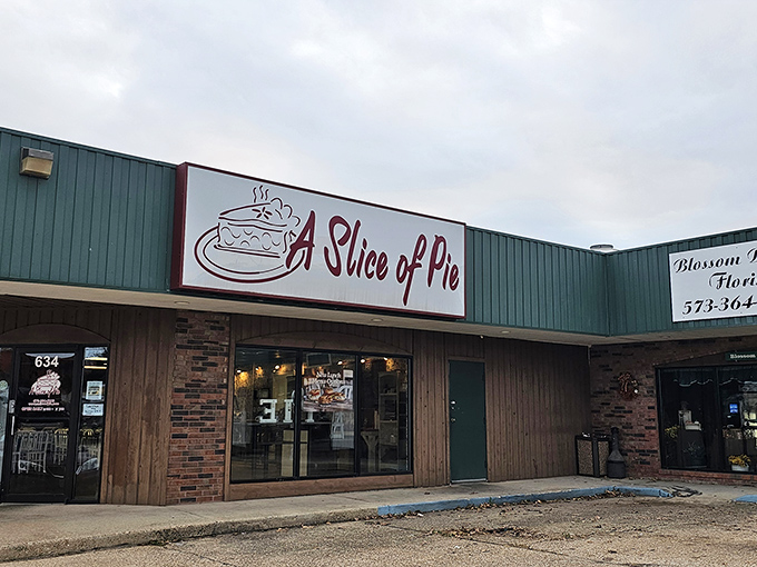 The unassuming exterior of A Slice of Pie stands like a dessert speakeasy, quietly promising treasures that make detours worthwhile.