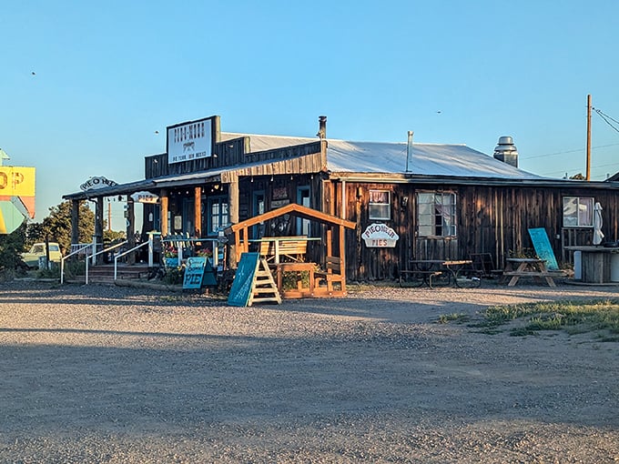 The weathered wooden facade of Pie-O-Neer stands like a delicious mirage in the New Mexico desert, promising sweet salvation to weary travelers.