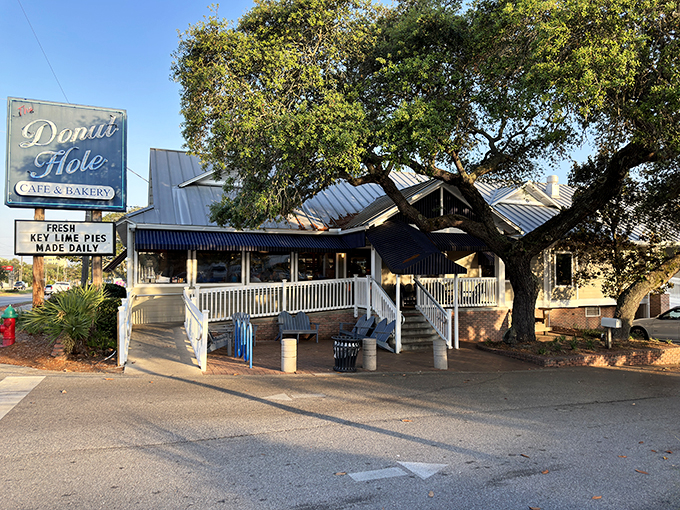 The white picket fence leading to donut paradise isn't just charming—it's a warning that your diet plans are about to be gloriously derailed.