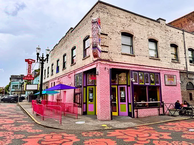 The corner where calories don't count. Voodoo Doughnut's iconic pink building stands like a sugar-powered beacon in downtown Portland, drawing pilgrims from across the globe. 