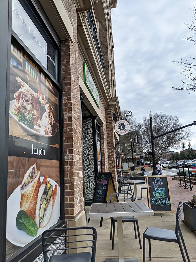 The brick façade and green accents of The Savory Gourmet Market beckon like a culinary lighthouse in Alpharetta. Simple outside, spectacular inside—just wait.
