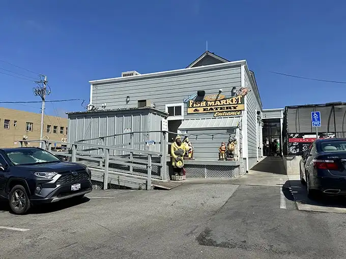 The unassuming exterior of Phil's Fish Market belies the culinary treasures within. Like finding a pearl in an oyster, this weathered facade houses seafood magic.
