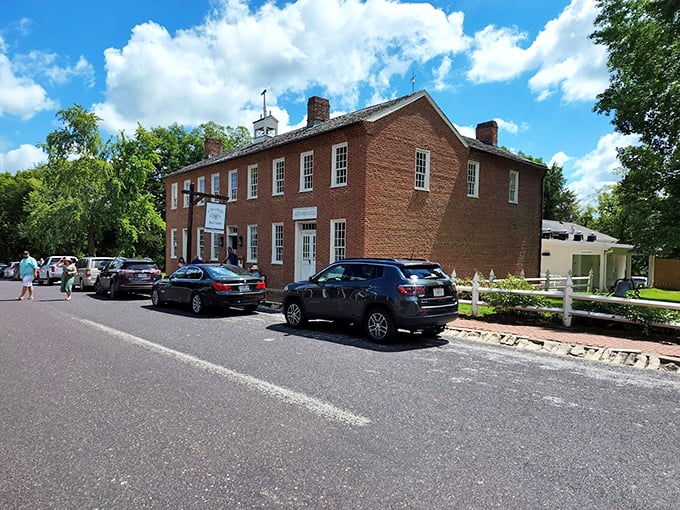 The historic red brick exterior of J. Huston Tavern stands proudly since 1834, making it the oldest continuously operating restaurant west of the Mississippi.