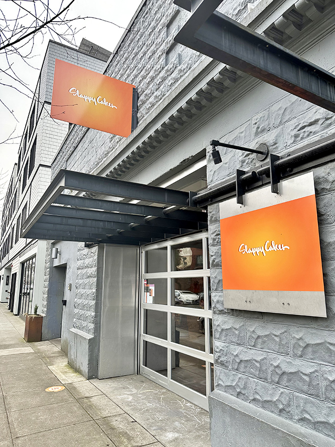 The unmistakable orange glow of Slappy Cakes stands out against Portland's gray skies like a breakfast beacon calling you home.