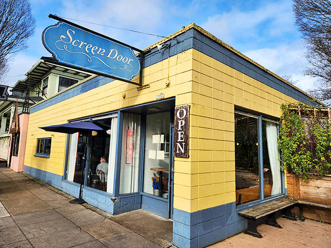 That cheerful yellow exterior isn't just a building—it's Portland's portal to the South, complete with the promise of comfort food salvation.