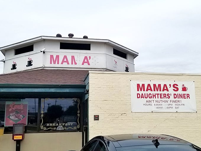 The unassuming exterior of Mama's Daughters' Diner promises what fancy restaurants can't – honest food that hugs your soul from the inside out.
