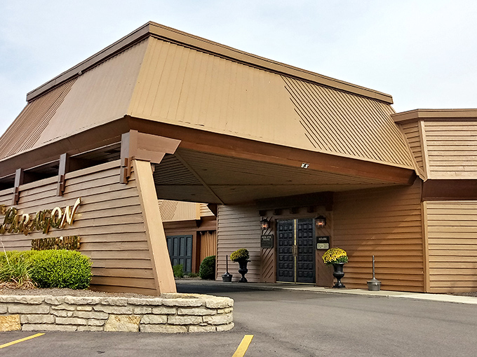 The unassuming exterior of The Paragon stands like a time capsule from the 1970s, promising retro delights within its wood-paneled walls.
