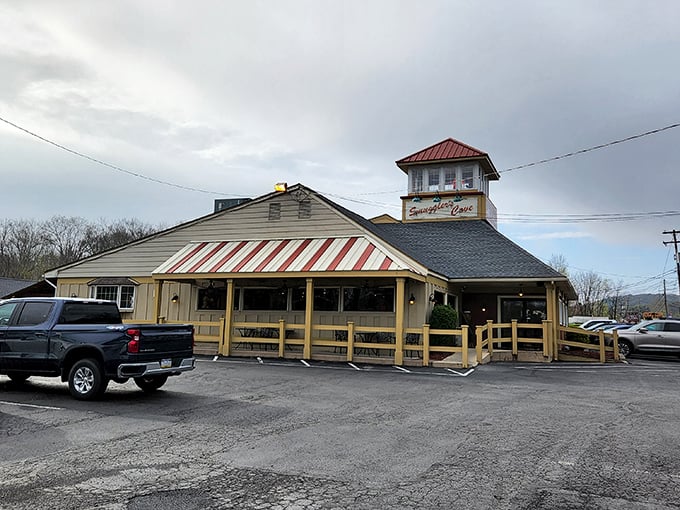 The maritime beacon of the Poconos, Smuggler's Cove stands proudly with its distinctive cupola and welcoming wooden deck, like a culinary lighthouse guiding hungry travelers home.  