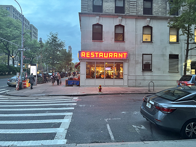 The iconic red "RESTAURANT" sign has welcomed hungry New Yorkers for decades—and yes, Seinfeld fans will recognize it instantly. 