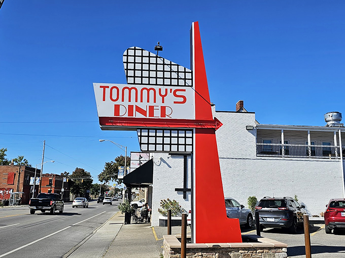 That iconic red and white sign isn't just advertising – it's a time machine promising comfort food and nostalgia at Tommy's Diner in Columbus.