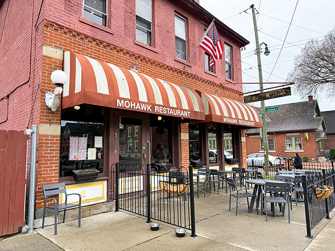 The iconic red-brick facade and striped awnings of The Old Mohawk aren't just charming—they're a beacon for sandwich pilgrims seeking salvation between two slices of bread.