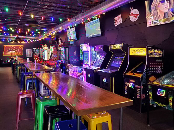 Basketball and beers – the adult version of a playground awaits at Dive Bar Hickory with NBA-themed arcade games and a unique beer token wall.