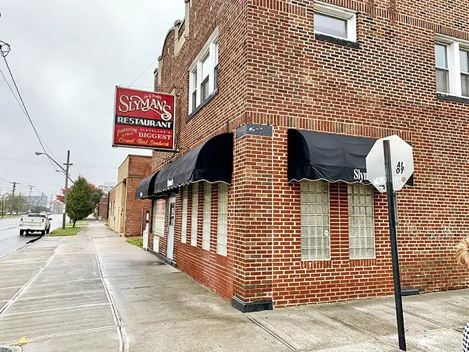 The brick facade of Slyman's stands like a temple to sandwich artistry, promising delicious revelations within its unassuming walls.