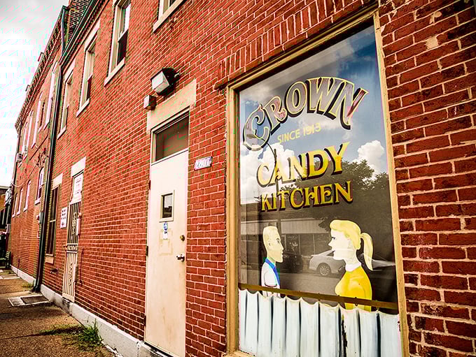The green-and-white striped awning of Crown Candy Kitchen isn't just a canopy—it's a time machine to when soda jerks ruled and calories didn't count.
