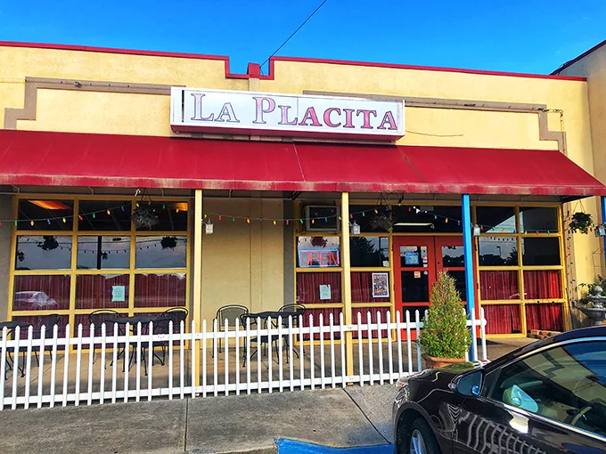 The vibrant green and yellow walls aren't just decoration—they're a preview of the colorful flavor fiesta about to happen on your plate.