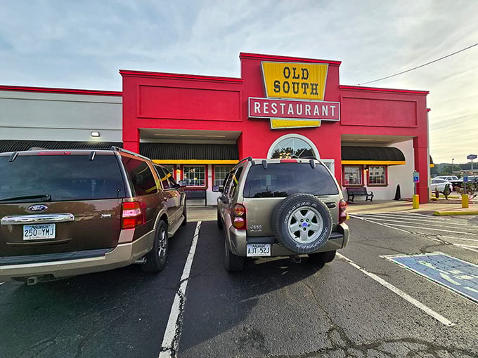 The bright red facade of Old South Restaurant stands like a beacon of comfort food salvation along the highway, promising delicious redemption for hungry travelers.