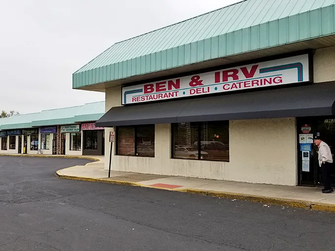 The unassuming exterior of Ben & Irv's hides culinary treasures within. That teal roof has sheltered sandwich seekers for generations.