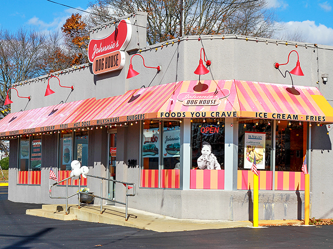 The candy-striped awning of Johnnie's beckons like a culinary lighthouse on Concord Pike, promising comfort food treasures within.