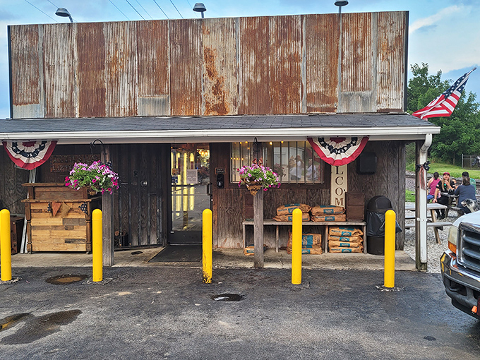 The rusted metal exterior isn't a gimmick—it's a promise. Authentic barbecue happens behind those weathered walls, where smoke signals spell "paradise."