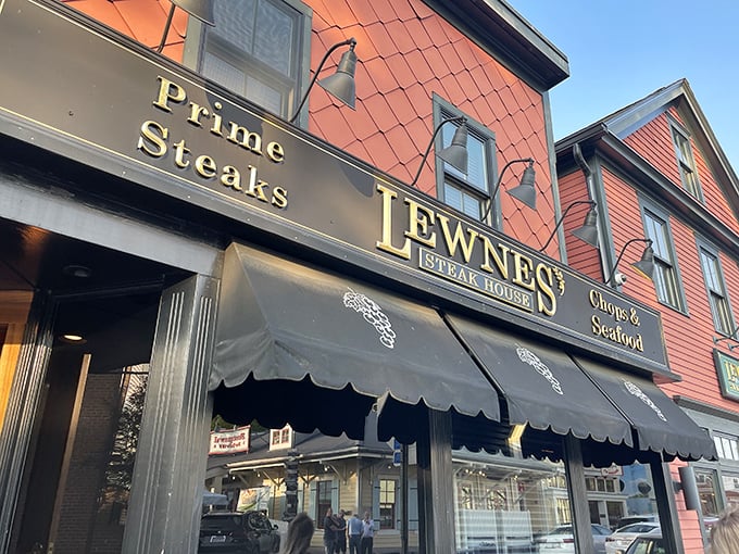 The unassuming exterior of Lewnes' Steakhouse in Annapolis hides a carnivore's paradise within. Classic diamond-patterned shingles and vintage awnings signal you've found the real deal.