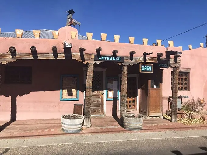The iconic adobe façade of High Noon stands like a sentinel of Southwestern cuisine, complete with wooden vigas and that unmistakable New Mexican charm.