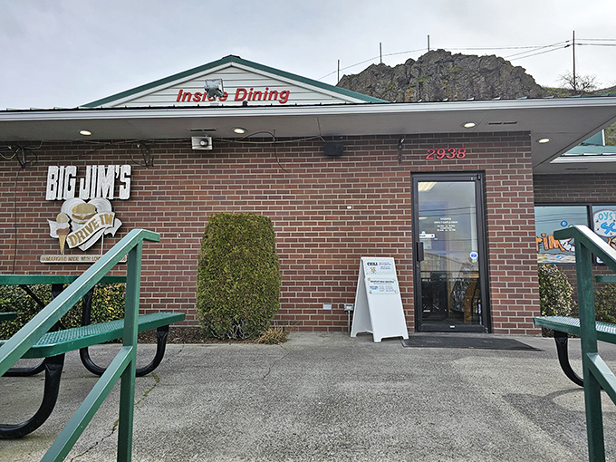 The unassuming brick exterior of Big Jim's hides a burger paradise within, like finding the Hope Diamond at a yard sale.