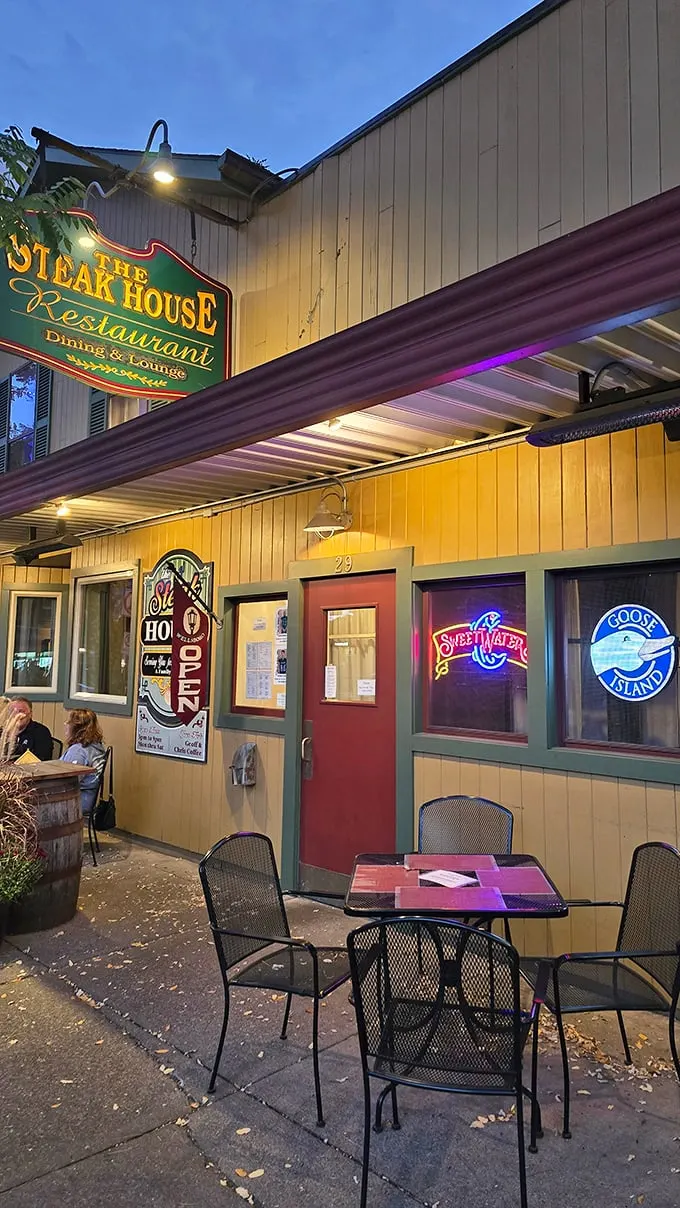 The classic yellow facade with its distinctive green sign welcomes hungry travelers like a beacon of hope for carnivores in downtown Wellsboro.