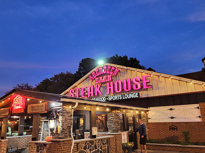 The iconic pink lettering against weathered white siding isn't just signage—it's a beacon for carnivores that's been guiding hungry Virginians home since 1966.